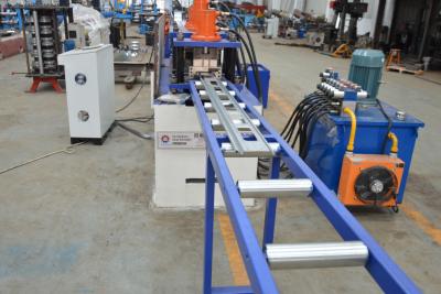 China 0.7-1.2mm Galvanized Steel Metal Shutter Door Roll Forming Machine for sale
