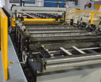 China Coated Roof Panel Roll Forming Machine Interlock Roof Panel Making Machine for sale