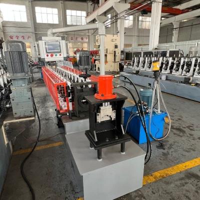 China 1.3mm Top Hat Stud and Track Roll Forming Machine Steel Light Keel Omega Profile 12 Rollers 5.5kW for sale