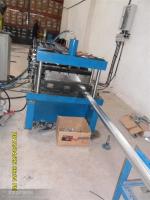 China Shutter Door Roll Forming Machine 7500kg 14 Stations 0.3-0.9mm Thickness PLC Control for sale