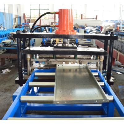 China Automatic Width Adjustable Racking Shelf Box Panel Roll Forming Machine 0.7-1.2mm Thickness for sale