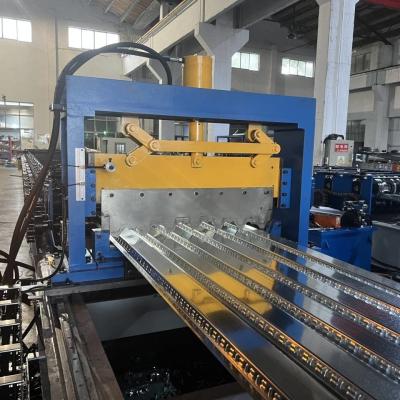 China Galvanized Steel 0.7-1.5mm 20m/min Hydraulic Cutting Floor Deck Roll Forming Machine 28 Stations for sale