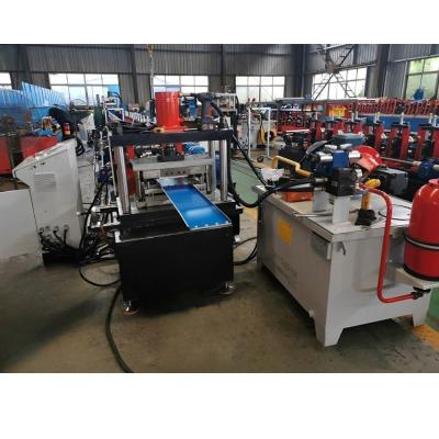 China 0.5mm-1.2mm Adjustable Shelf Back Box Panel Roll Forming Machine Storage Rack Board for sale