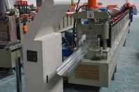 China 45# Forge Steel K Style Gutter Roll Forming Machine by Chain 18 Roller Stations for sale