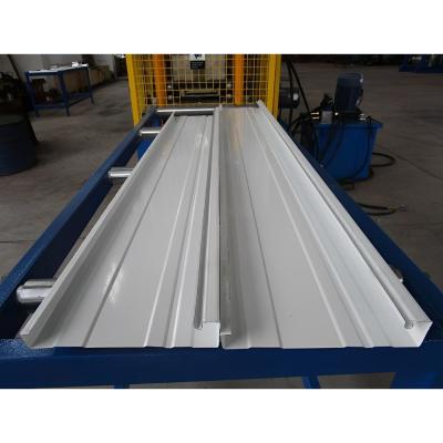 China Galvanized Steel PPGI Metal Fascia Cover Roll Forming Machine 0.3-0.8mm Thickness 15-20m/min for sale