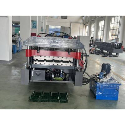 China PPGI Zinc Metal Roof Making Machine 0.3mm Full Automatic Trapezoid 5 Rib Roll Forming for sale