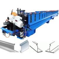 China Metal Shutter Door Bottom Slat Roll Forming Machine 0.7-1.2mm T Bar Rail Making Machine for sale