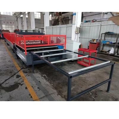 China High Speed 0.4-0.7mm Color Painted Galvanized Steel Trapezoidal Roof Sheet Roll Forming Machine for sale