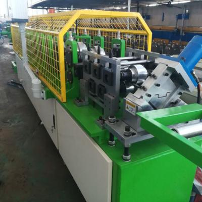 China Galvanized Steel 0.6-1.2mm Hat Profile Furring Channel Roll Forming Machine for Ceiling for sale