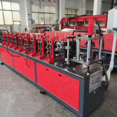 China 0.6-1.2mm Galvanized Steel V Channel Roll Forming Machine For Shelf Support for sale