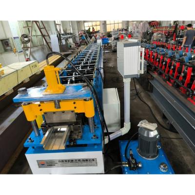 China Galvanized Steel Aluminum Flat Pan Deck Roll Forming Machine for Patio Covers Awning System 0.4-0.8mm for sale