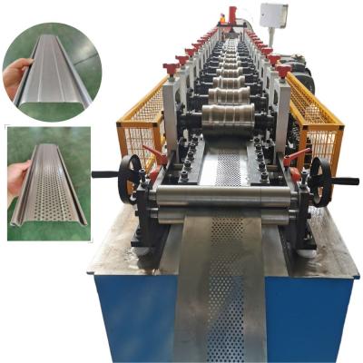 China Galvanized Steel Rolling Shutter Door Slat Roll Forming Machine 0.7-1.2mm Thickness with Perforated Holes for sale