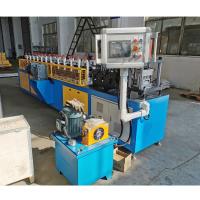 China Galvanized Steel Rolling Shutter Door Slat Roll Forming Machine 0.7-1.2mm Thickness with Perforated Holes for sale