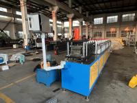 China Galvanized Steel Shutter Door Roll Forming Machine 0.7-1.2mm Thickness with Perforation for sale
