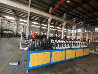 China Galvanized Steel Shutter Door Roll Forming Machine 0.7-1.2mm Thickness with Perforation for sale