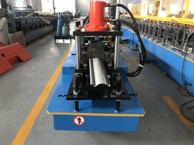 China Punching holes 0.7-1.2mm Metal Automatic Rolling Shutter Roll forming Machine for sale
