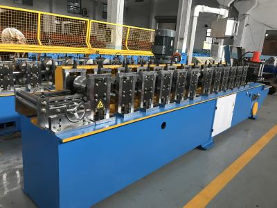 China Metal Shutter Door 12 Stations Roll Forming Machine PLC Control System 0.5-1.2mm for sale