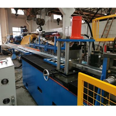 China Multiple Sizes C Purlin Roll Forming Machine Metal C Section Making Machine with Servo Following Cutting for sale