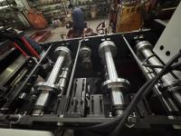 China 0.3-0.7mm PPGI Roller Punching Snap Lock Roof Panel Roll Forming Machine for sale