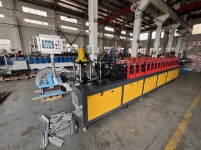 China Euro Style 0.7-1.2mm Galvanized Steel Roll Forming Machine for 100x23mm Shutter Door Slat for sale