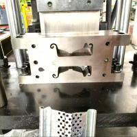 China 0.6-1.2mm Galvanized Steel European Shutter Door Slat Roll Forming Machine with Dual-Purpose Blade 5.5KW for sale