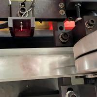 China 1.0-1.5mm Carbon Galvanized Steel C U Profile Door Frame Roll Forming Machine with Punching 7.5KW for sale
