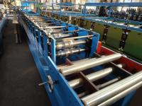 China 0.3-0.8mm Color Painted Facade Metal Wall Panel Roll Forming Machine with Hydraulic Punching for sale