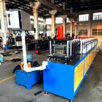 China línea de perforación integrada para puerta enrollada plana de seguridad Máquina formadora Cortinas rodillos industrial para bodegas y tiendas en Chile for sale