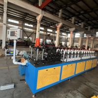 China línea de perforación integrada para puerta enrollada plana de seguridad Máquina formadora Cortinas rodillos industrial para bodegas y tiendas en Chile for sale