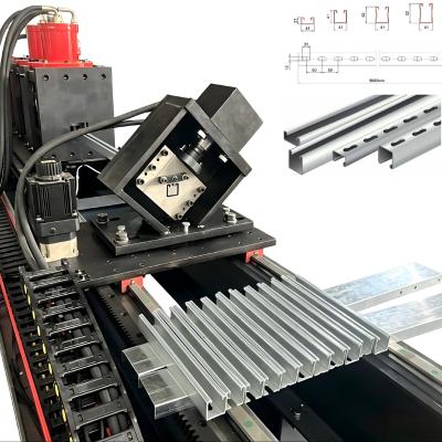 China Hydraulic Punching 1.5-2.5mm GI Stainless Steel Strut Channel Slotted & Unsoltted Uni Solar Structure Channel Roll Forming Machine With Servo Following Cutting For Sale for sale