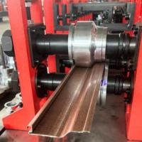 China 0.7-1.2mm Galvanized Steel Aluminum Door Bottom Rail Roll Forming Machine Warehouse Shop & Industrial Rolling Shutter Door for sale