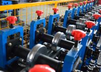China 12 Rollers Steel T Post Stud And Track Roll Forming Machine With Hydraulic Punching Holes for sale