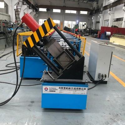 China 2.0-3.0mm Carbon Steel Beam Purlin Roll Forming Machine 22 Stations 12m/min for sale