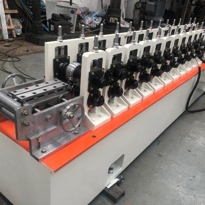 China Stainless Steel Glass Sliding Door Channel Roll Forming Machine 30m/min Servo Cutting for sale