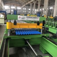 China 1250mm Feeding Width  Servo Cutting Roof Panel Roll Forming Machine for sale