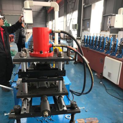 China 60mm Diameter Roller 112mm Width Galvanized Coils Shutter Profile Roll Forming Machine 7.5KW for sale