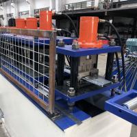 China 0.7-1.2mm Roller Shutter Salt Door Forming Machine with Perforated Holes 380V 3 Phase for sale