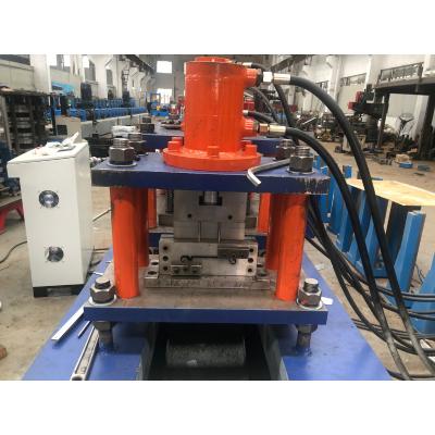 China 1.2mm Galvanized Steel Shutter Door Cold Roll Forming Machine 12 Stations 380V for sale