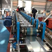 China 5.5KW Punching Embossing Galvanized Metal Sheet Shutter Door End Bottom Roll Forming Machine for sale