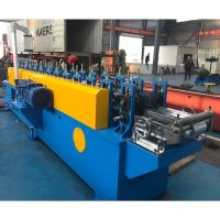 China 5.5KW Punching Embossing Galvanized Metal Sheet Shutter Door End Bottom Roll Forming Machine for sale