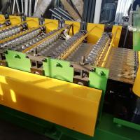 China 1064mm Width Aluminum Zinc Roof Panel Roll Forming Machine for sale