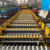 China 1064mm Width Aluminum Zinc Roof Panel Roll Forming Machine for sale