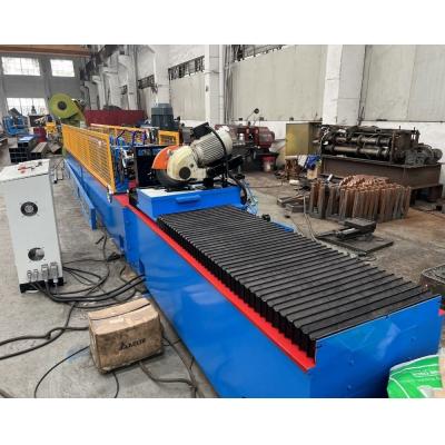 China 60mm Shutter Door Roll Forming Machine Servo Following Saw Cutting for sale