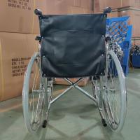 China Multifunctional Folding Steel Wheelchair 100kg Capacity Detachable Desk Armrest Elevating Footrest for sale