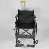 China Folding Steel Wheelchair with Solid Castor Wheels Black Powder Coating Frame 18 Inch Seat for sale