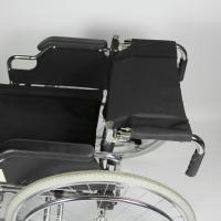 China Folding Steel Wheelchair 100kg Capacity Flip Up Armrest Detachable Footrest Easy Carry for sale