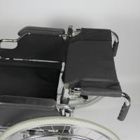 China Folding Steel Wheelchair with Flip Up Armrest and Detachable Footrest 8 Inch Castor for sale