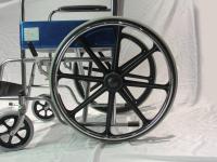China Solid Castor Folding Steel Wheelchair Fixed Armrest And Footrest for sale
