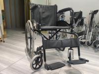China Fixed Armrest Folding Steel Wheelchair 100kg Capacity 44cm Seat Width for sale