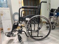 China Fixed Armrest Folding Steel Wheelchair 100kg Capacity 44cm Seat Width for sale
